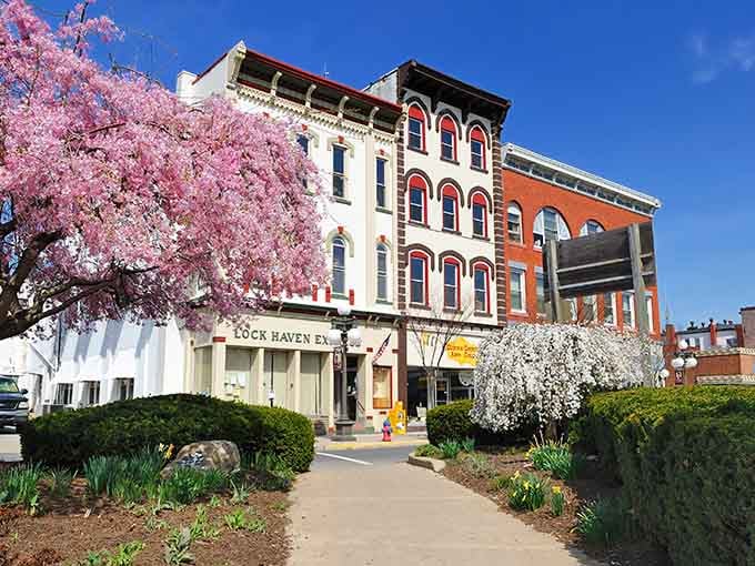 Spring flowers frame these historic buildings where red brick meets cream stone in architectural harmony that soothes the soul.