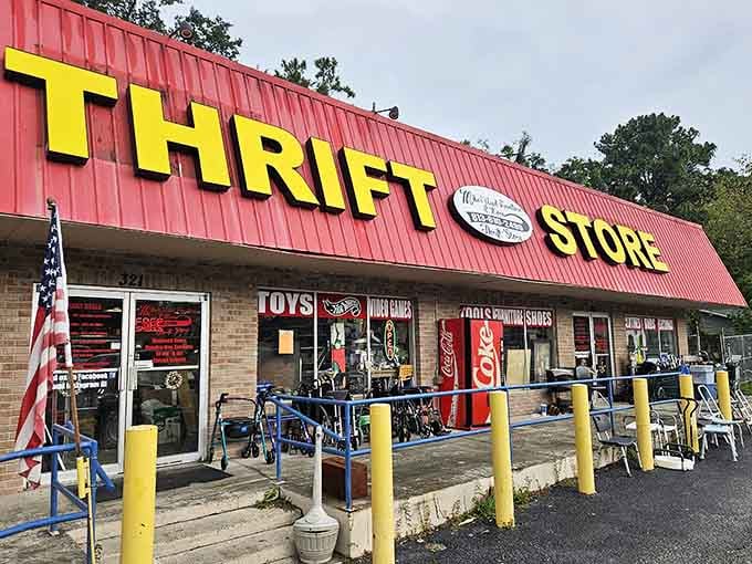 Yellow letters shout "THRIFT STORE" loud and proud, with patriotic flair and outdoor displays adding character galore.