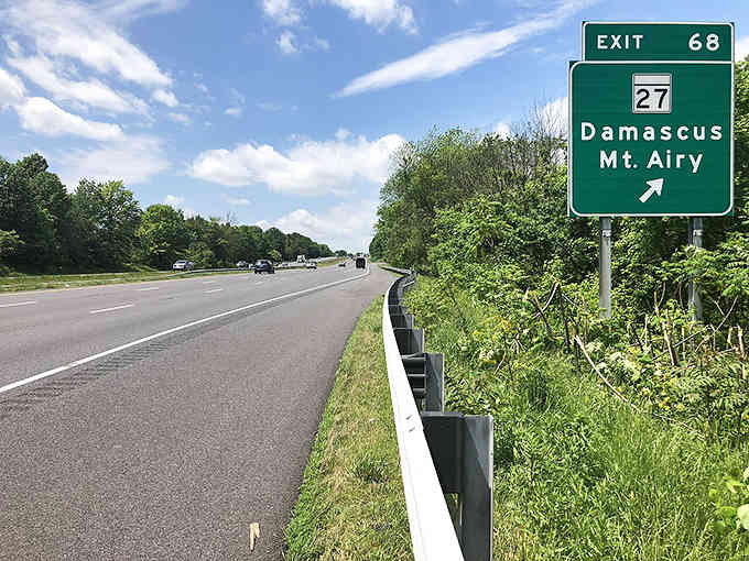 The highway sign points toward Damascus and Mount Airy, reminding you that peaceful retirement destinations are just one exit away.