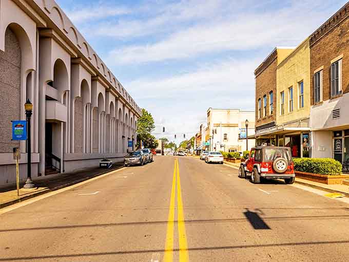 Those repeating arches create a rhythmic beauty along the street like architectural music for your eyes.