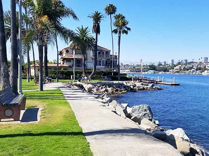Palm-lined pathways and manicured lawns meet sparkling harbor waters in this picture-perfect coastal escape.