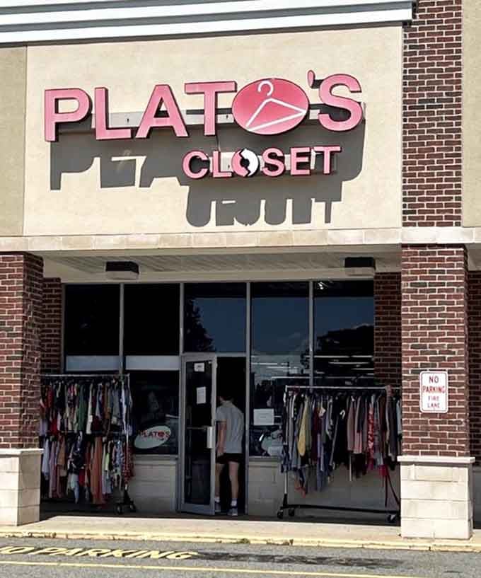 Racks of colorful clothing visible through those glass doors hint at the fashion treasures waiting for budget-conscious style seekers.