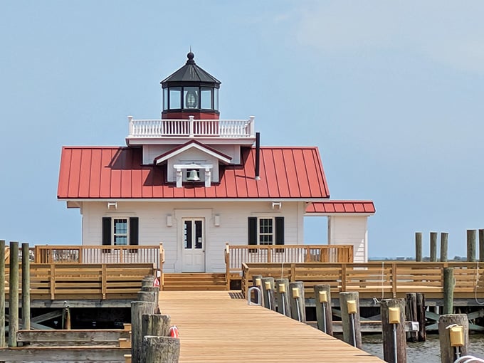 The cheerful red roof and green shutters give this water-bound lighthouse the charm of a floating bed-and-breakfast.