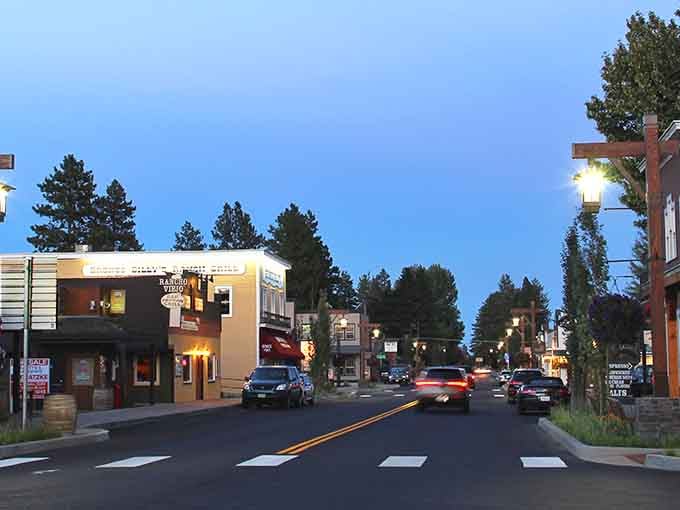 As twilight descends on the main street, the warm glow from shops and restaurants beckons you to explore just one more store.