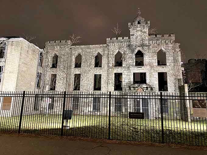 Night illumination transforms the abandoned hospital into something from a Tim Burton film, beautifully eerie and unforgettable.