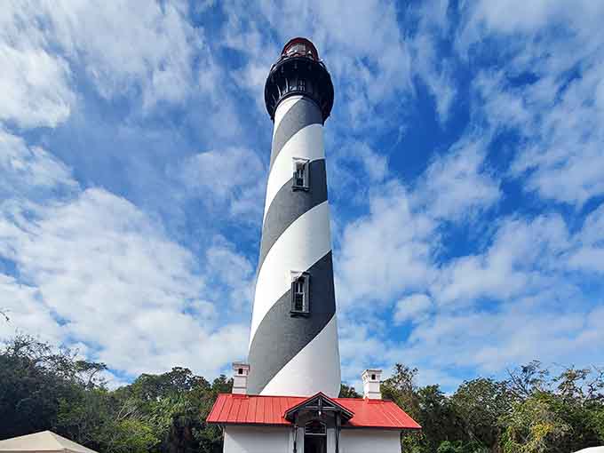 The black and white spiral draws your eye upward in a mesmerizing pattern that sailors have trusted for generations of safe passage.