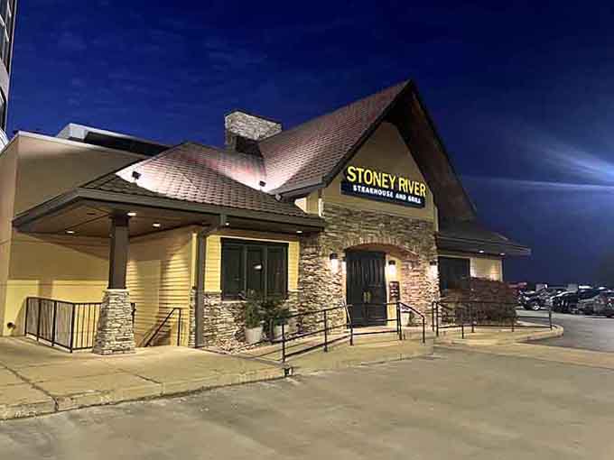 Evening descends on this handsome steakhouse, where the glowing windows beckon hungry diners toward perfectly prepared cuts of premium beef.