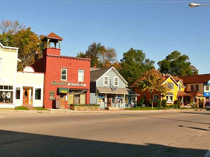 Golden autumn light bathes the street in warmth, making even the fire hydrants look like they belong here.