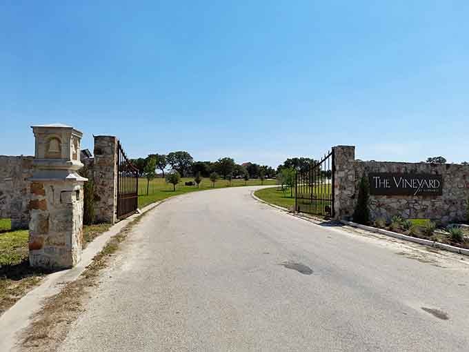 Those iron gates open onto rolling vineyard grounds that could easily fool anyone into thinking they're touring Italy.