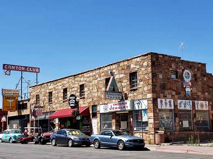 Stone buildings and classic signs line streets where the Mother Road still runs strong through America's heartland memories.