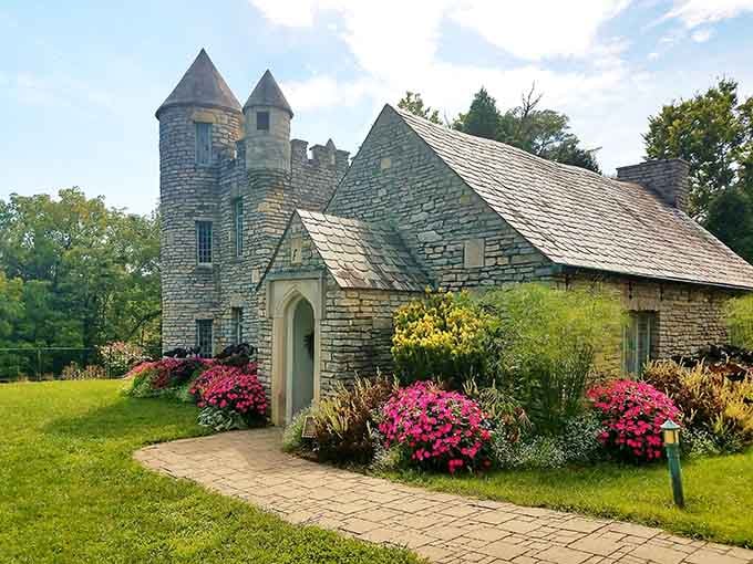 This storybook castle tucked among the flowers looks like it wandered straight out of a European fairy tale into Kentucky.