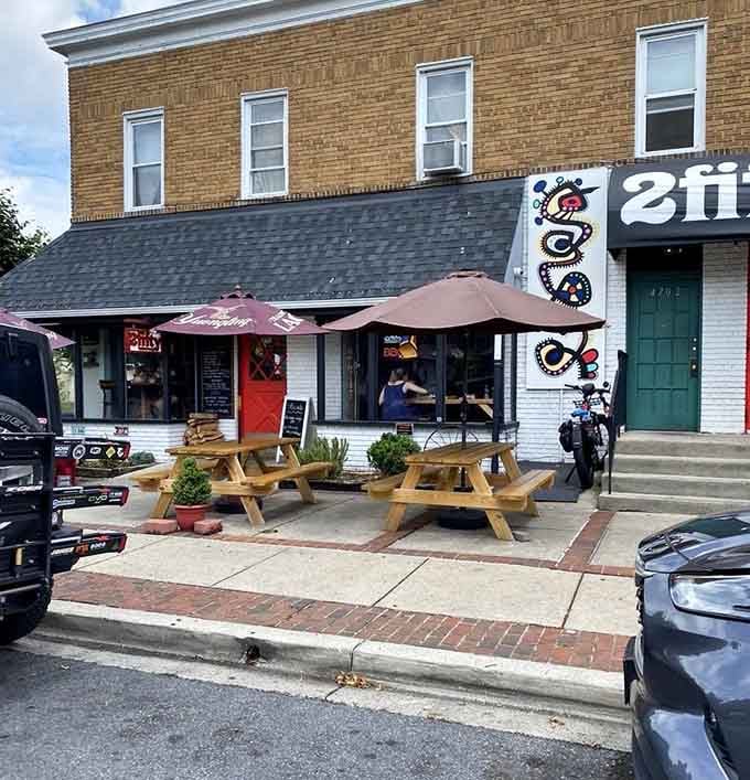 Those picnic tables out front are prime real estate for watching the world go by between bites of brisket.