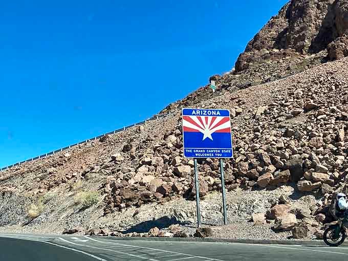 Even the Hoover Dam road can't compete with the joy of spotting that welcome sign just beyond it.