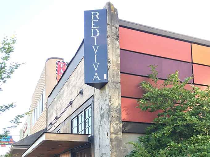 The Rediviva's vintage marquee signals downtown's ongoing revival, one local business at a time, authentically and affordably.