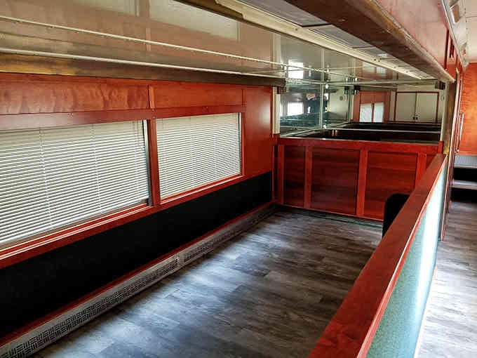 Vintage train car interiors feature rich wood paneling that puts modern plastic everything to absolute shame.