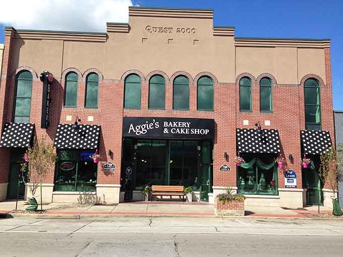 The historic building adds character to your donut run, because even architecture appreciates good baking apparently.