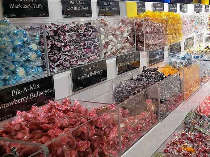 The Pik-A-Mix wall offers endless combinations, where strawberry bullseyes and root beer barrels await your shopping basket.