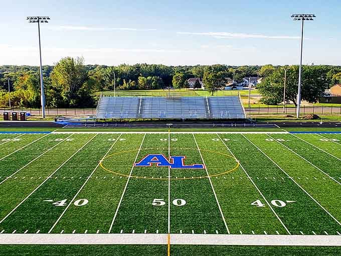 Friday night lights shine on this field where local heroes are made and community pride runs deep.