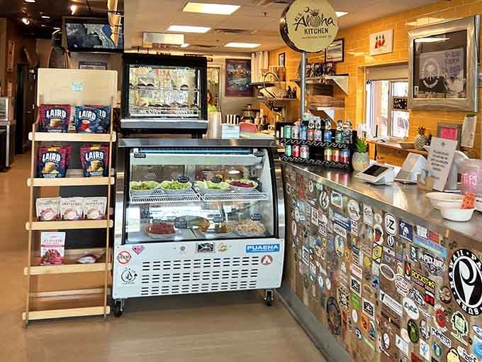 The display case beckons like a treasure chest, promising fresh ingredients that'll transform your lunch into an adventure.