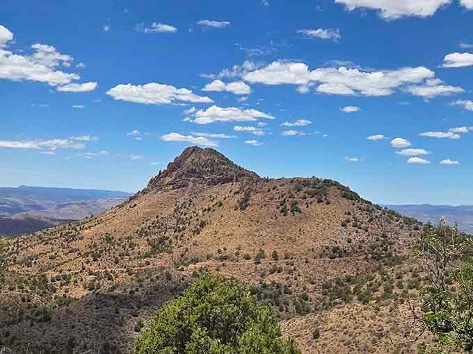 This volcanic peak stands guard over the landscape like a patient sentinel watching over centuries.