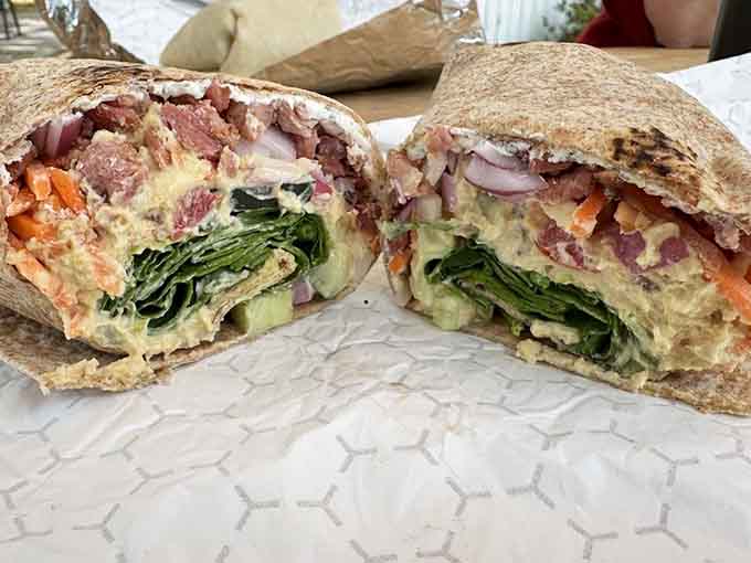 A veggie wrap so colorful and stuffed it makes eating your greens feel like an actual adventure.