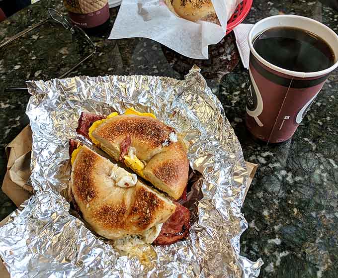 Coffee and a loaded breakfast sandwich on a fresh bagel&mdash;the kind of morning fuel that makes everything else seem possible.