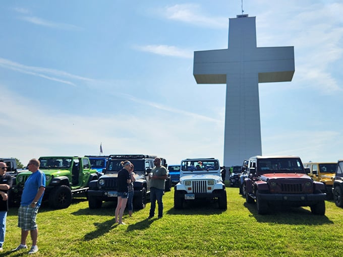 Special events like the Blessing of the Jeeps bring communities together beneath the cross for celebrations of faith and fellowship.