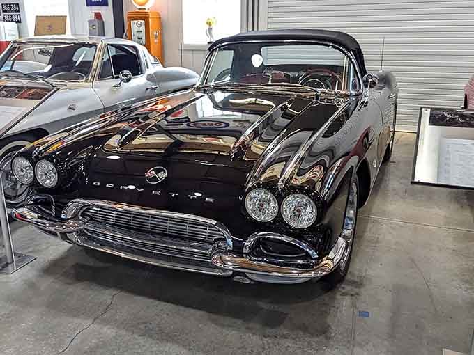 That black Corvette's curves could make a grown collector weep with joy and nostalgia in equal measure.