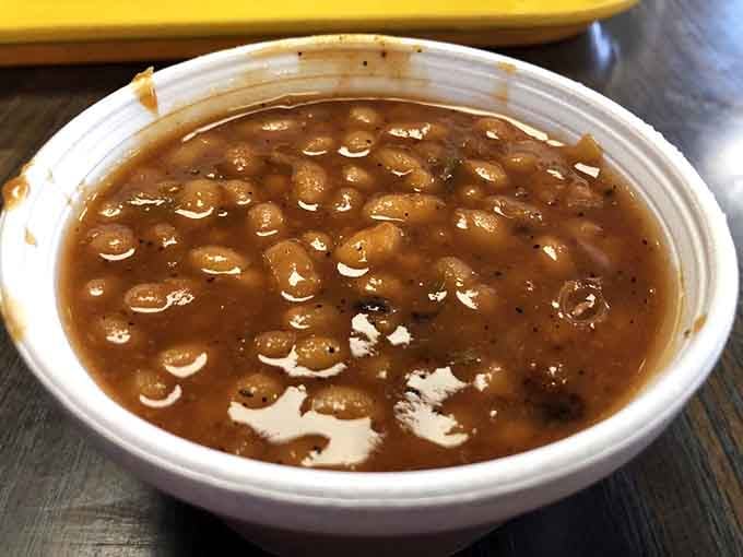 Baked beans swimming in sauce with chunks of meat mixed in, because why wouldn't you add more meat?