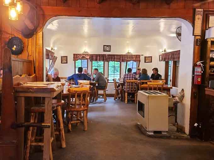 Real wood paneling and pendant lighting create that authentic lodge atmosphere you simply cannot fake with modern construction.