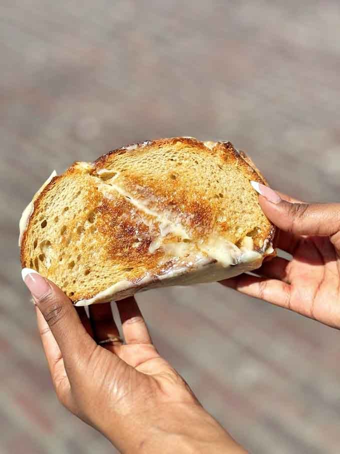 This grilled cheese achieves what we all dream about: perfectly golden bread hugging molten, stretchy cheese perfection.