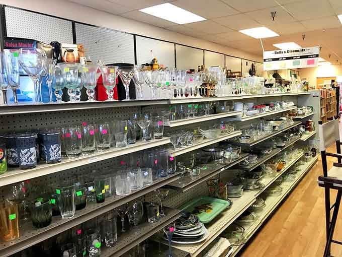 Glassware gleaming on shelves, ready to host your next dinner party with vintage charm and style.