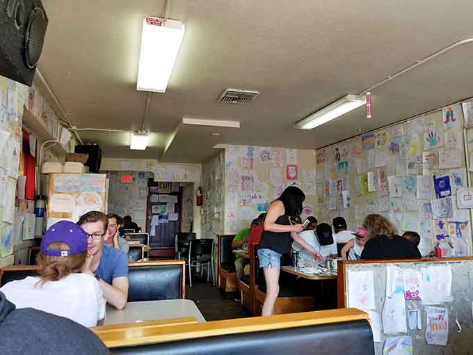 The eclectic crowd and crayon-covered walls tell you everything about this place's welcoming, wonderfully chaotic soul.