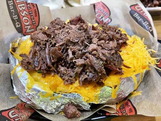 Loaded baked potato topped with pulled brisket turns a side dish into main event territory.