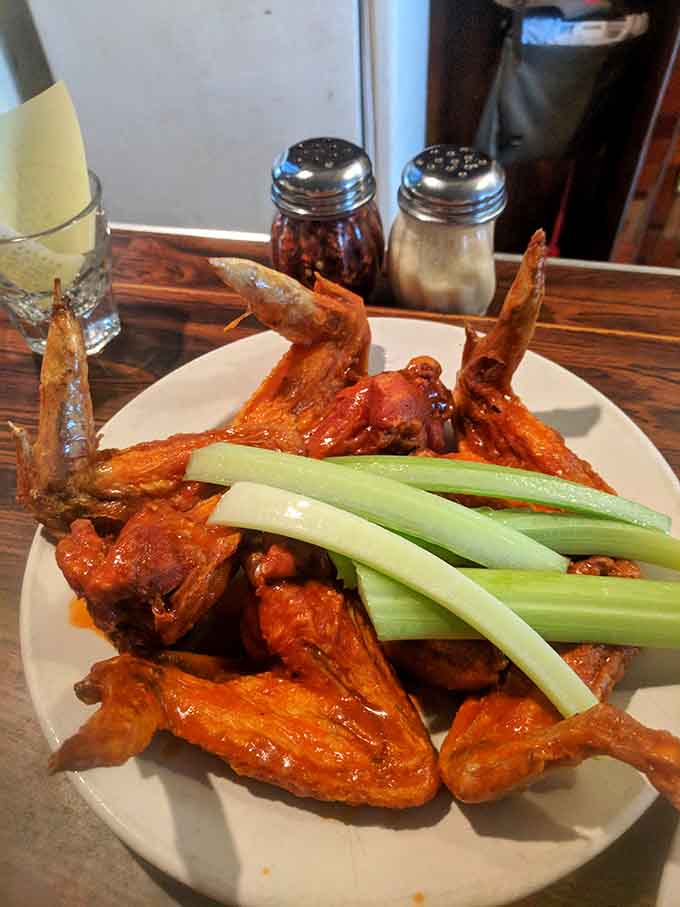 Wings so saucy they come with celery sticks as both garnish and necessary palate cleanser for the journey ahead.
