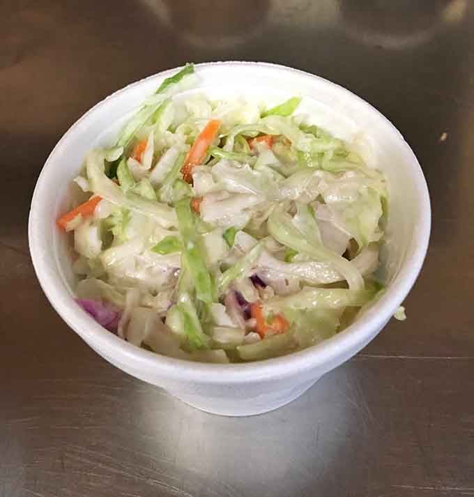 Creamy coleslaw with its crisp cabbage and tangy dressing provides the cool, refreshing counterpoint every great barbecue plate needs.