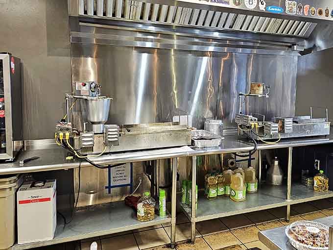 Gleaming stainless steel equipment stands ready to transform batter into warm circles of happiness.