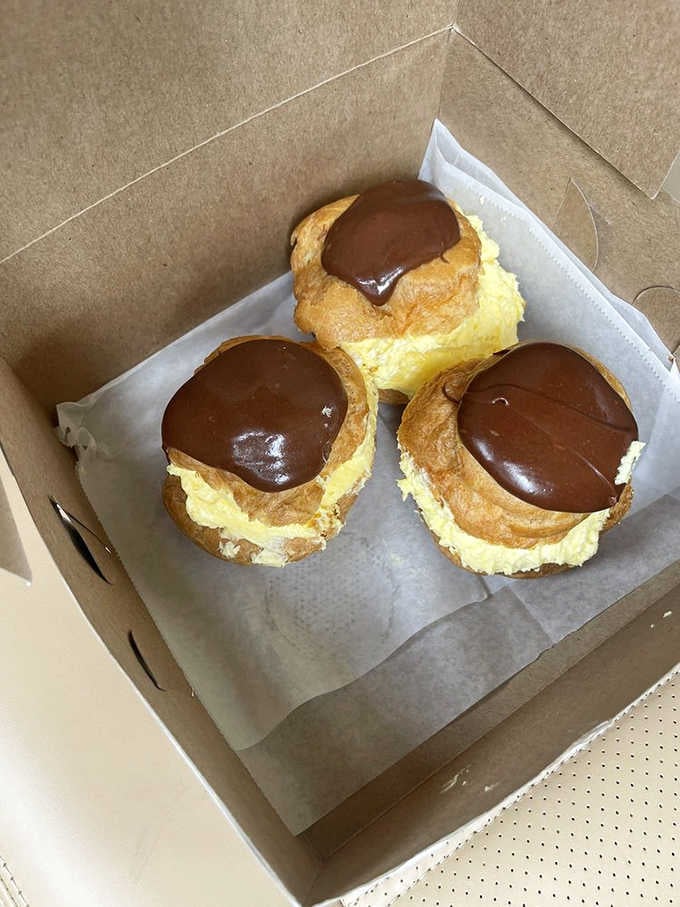 Cream puffs with chocolate tops that look like they belong in a French patisserie, not a Pennsylvania family restaurant, yet here we are.
