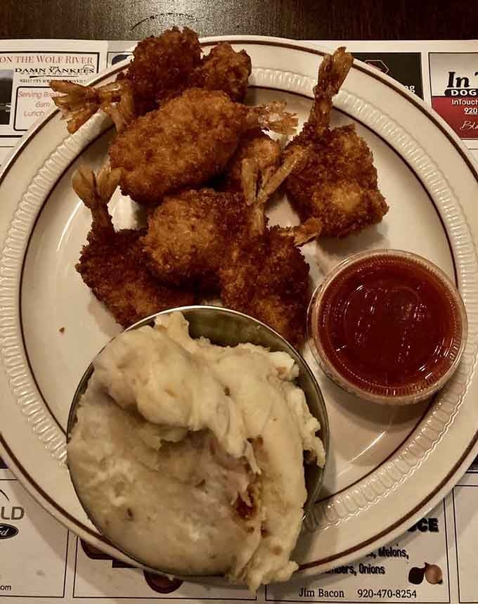 Fantail shrimp breaded and fried to golden perfection, served with mashed potatoes that understand their supporting role.