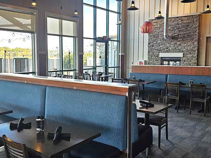 Floor-to-ceiling windows ensure the lake views compete with your meal for attention, and somehow both win every time.