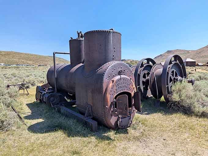 Rusting mining machinery dots the landscape like industrial sculptures, monuments to backbreaking labor and impossible dreams of striking it rich.