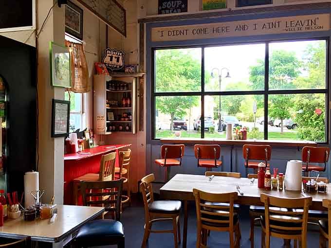 Large windows flood the space with natural light, making every meal feel like a celebration of good food.