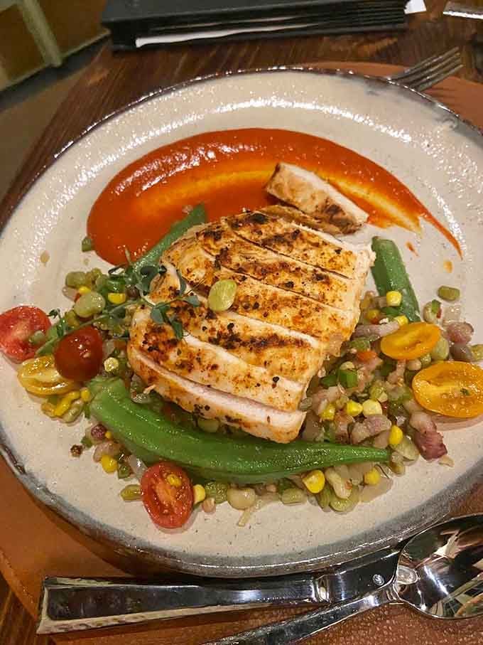 Bourbon barrel chicken breast sliced to perfection, proving that Kentucky's favorite spirit improves everything it touches, including poultry.