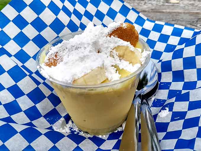 Homemade banana pudding topped with whipped cream and a cookie is comfort food at its finest hour.