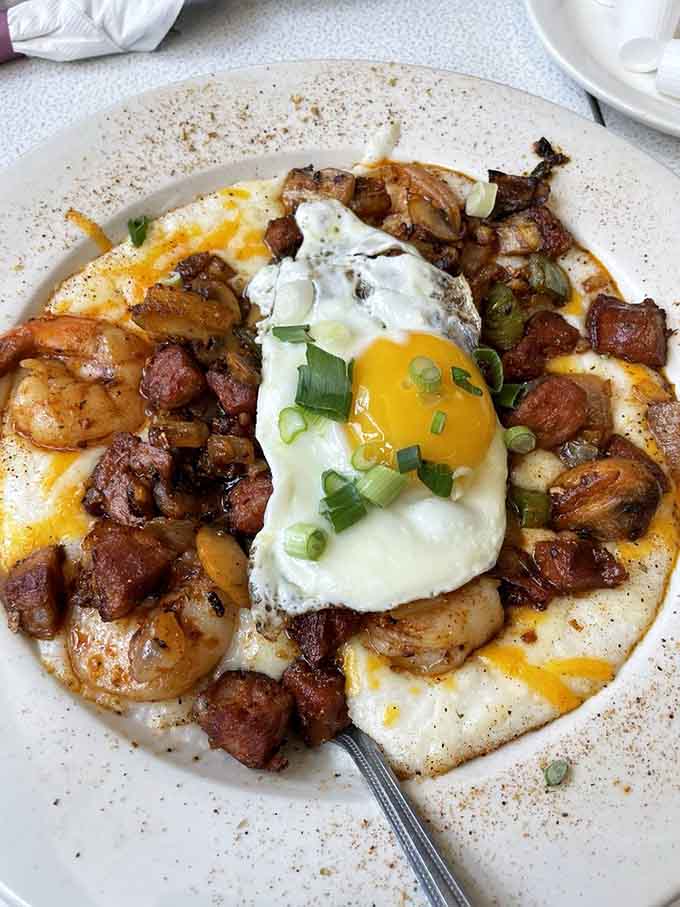 Shrimp and grits topped with a sunny-side egg, because sometimes breakfast needs a Southern accent.