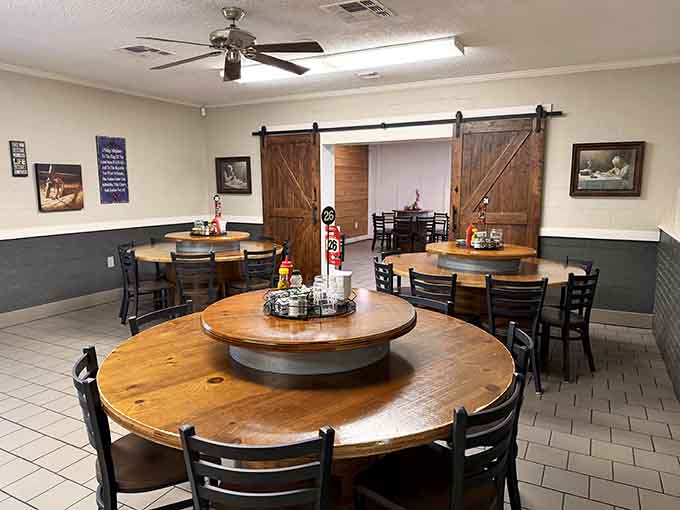 Round tables loaded with Southern sides create a family-style feast that turns strangers into friends over shared butter bean appreciation.