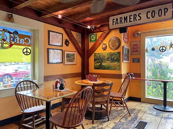 Sunny yellow walls and vintage signs create a dining room that feels like your coolest aunt's kitchen, if she could cook professionally.