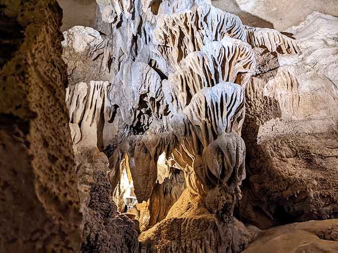 Flowstone cascades frozen in geological time, proving nature's the original abstract artist with unlimited patience and talent.