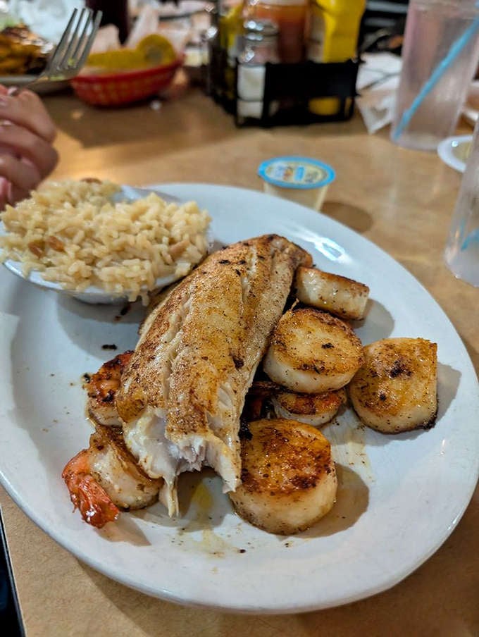 Grilled fish and scallops prove Catfish Deweys knows its way around seafood that isn't battered and fried.