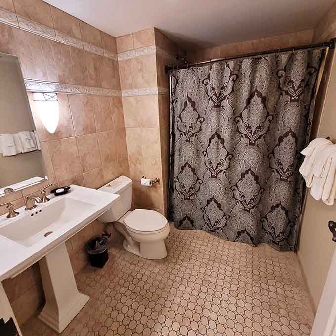 Bathroom tilework that proves someone understood the assignment and then exceeded all reasonable expectations beautifully.